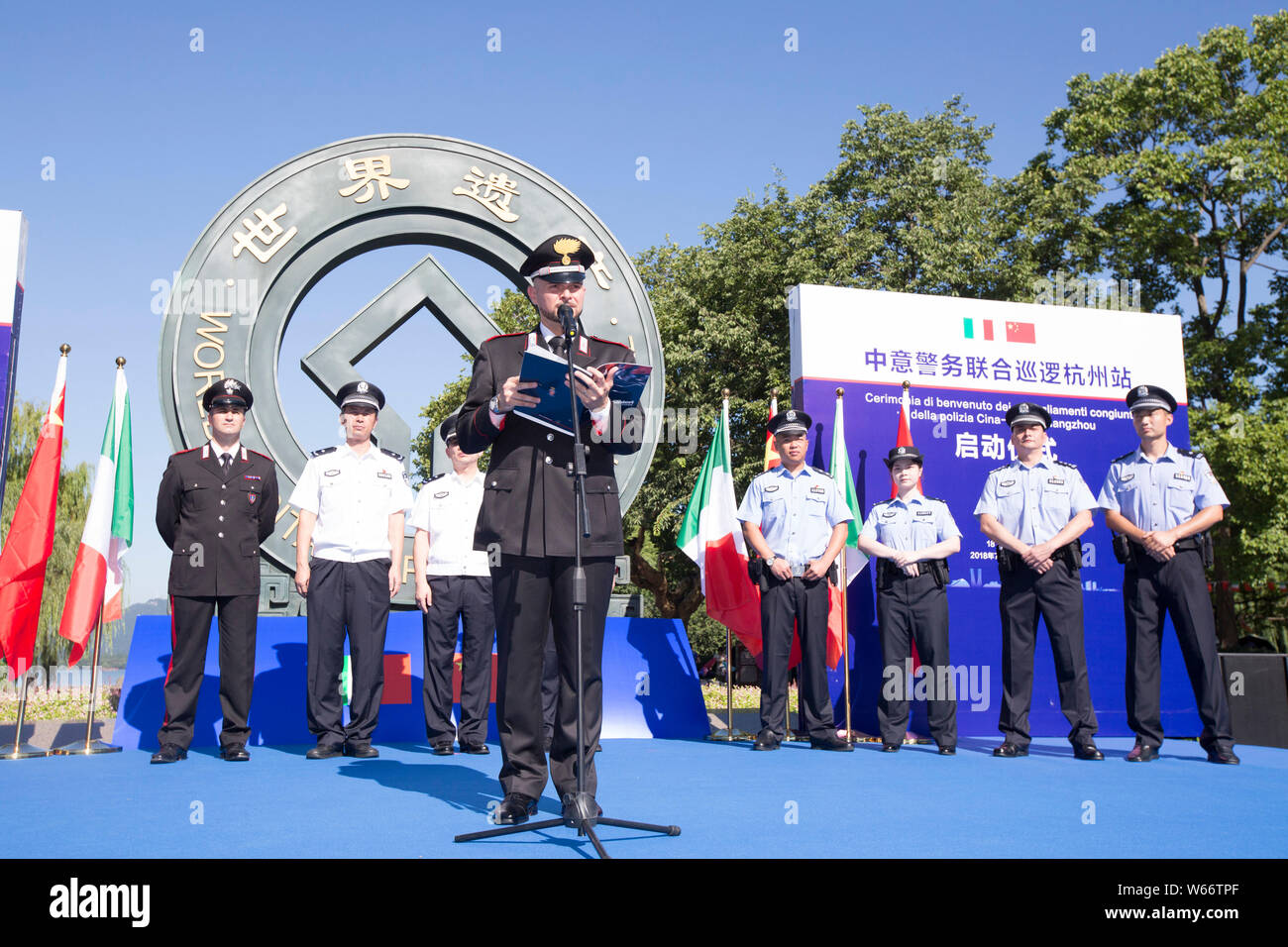 An Italian police officer speaks during a ceremony to mark the start of ...