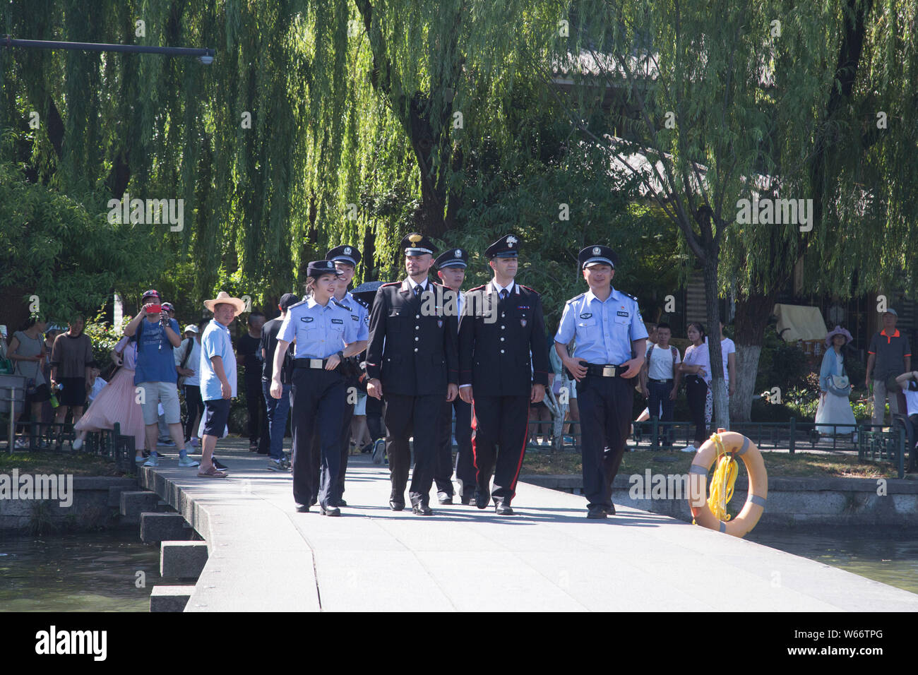 Italian police officers conduct joint patrols with Chinese police ...