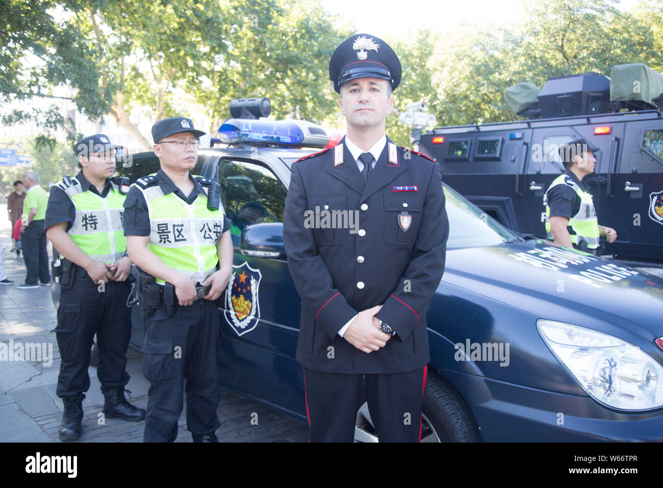 An Italian police officer conducts joint patrols with Chinese police ...