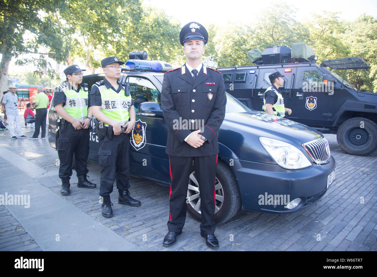 An Italian police officer conducts joint patrols with Chinese police ...