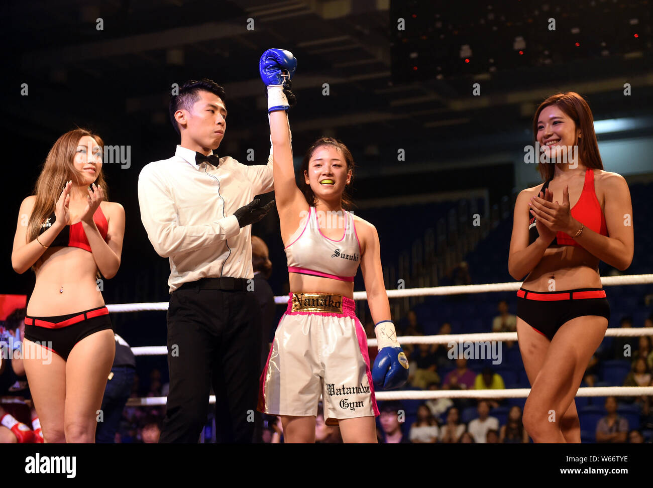 Nanako Suzuki of Japan defeats Wong Ka-yan of Hong Kong in their women's light-flyweight bout ...