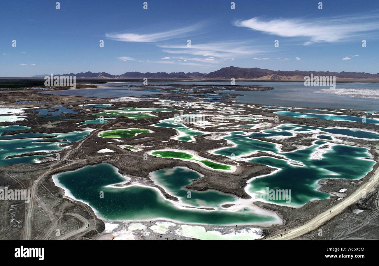 Aerial view of the Da Qaidam salt lake featuring the shape of emeralds ...