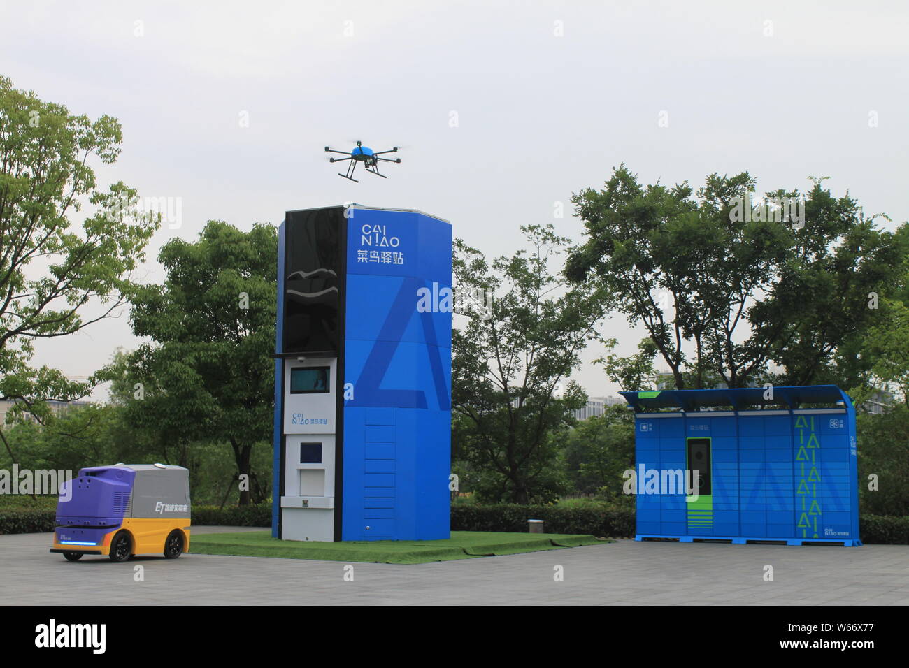 An unmanned logistics vehicle of Alibaba's Cainiao Logistics works at a ...