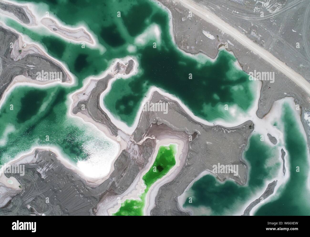 Aerial view of the Da Qaidam salt lake featuring the shape of emeralds ...