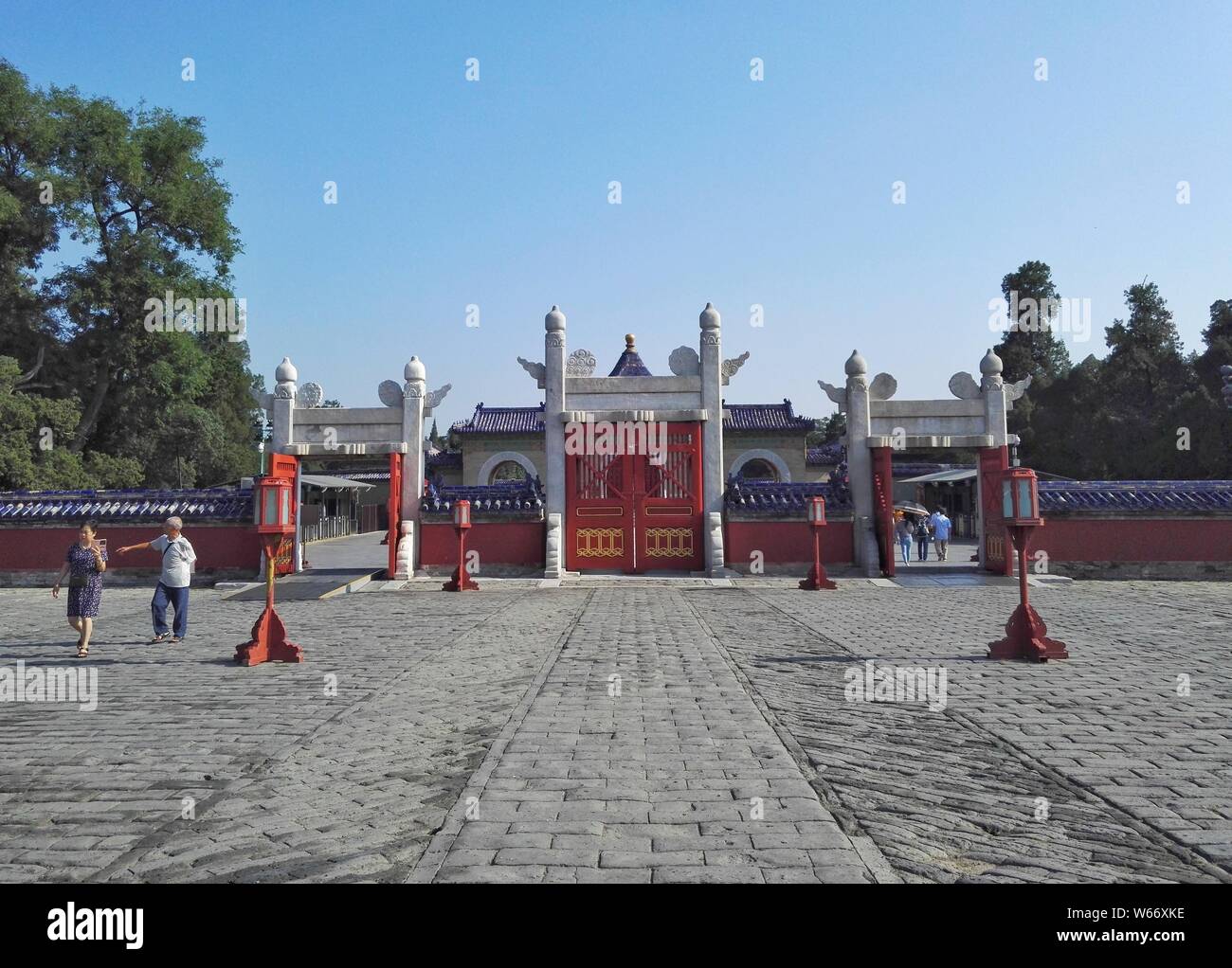 Tourists visit a historic scenic spot along the Zhongzhou Road ...