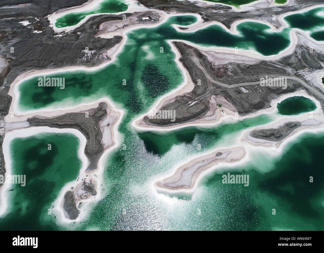 Aerial view of the Da Qaidam salt lake featuring the shape of emeralds ...