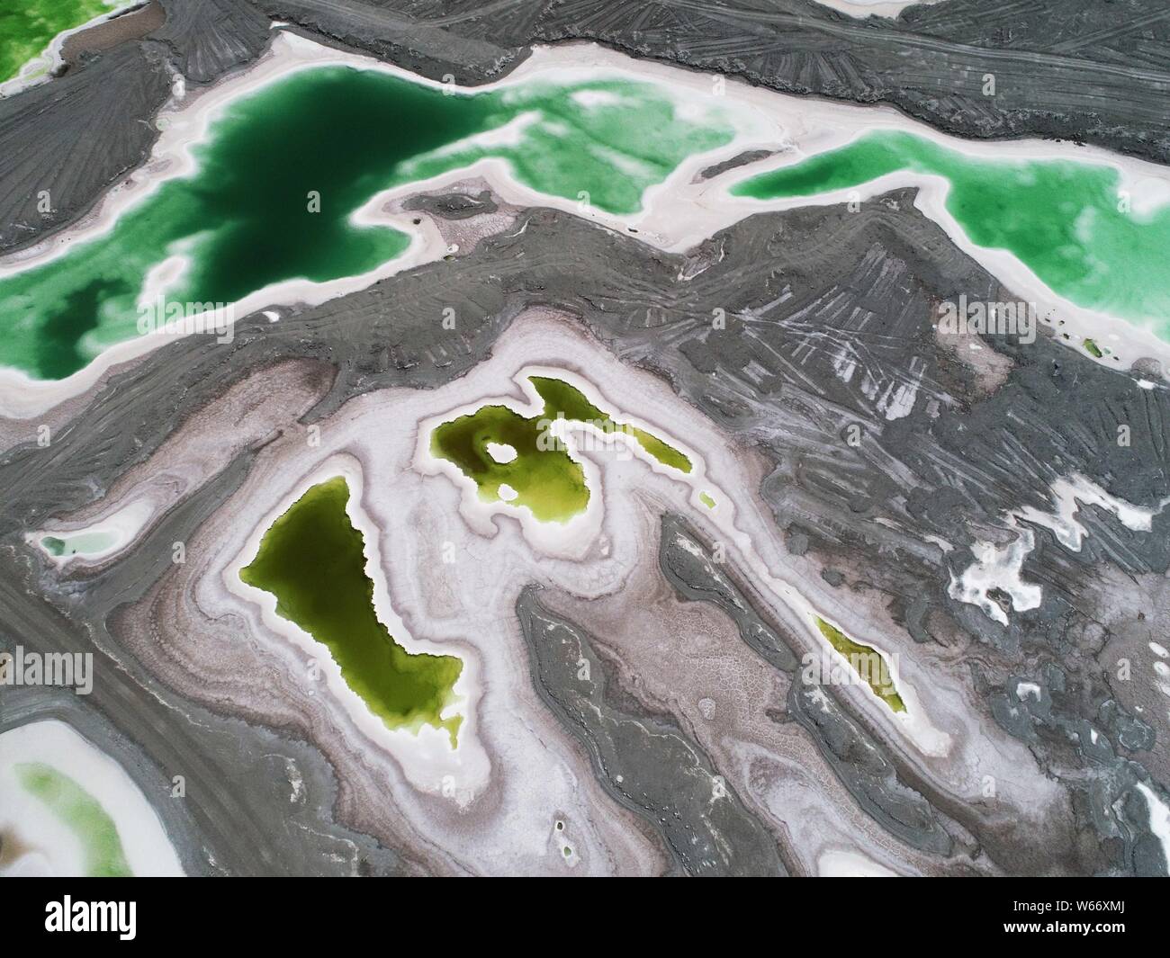 Aerial view of the Da Qaidam salt lake featuring the shape of emeralds ...