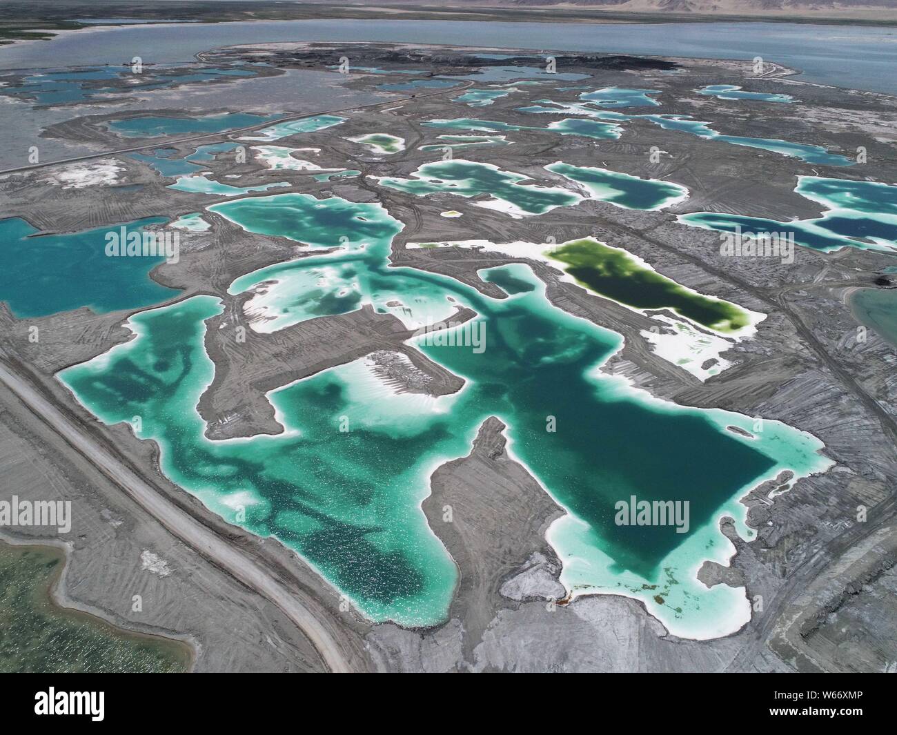 Aerial view of the Da Qaidam salt lake featuring the shape of emeralds ...