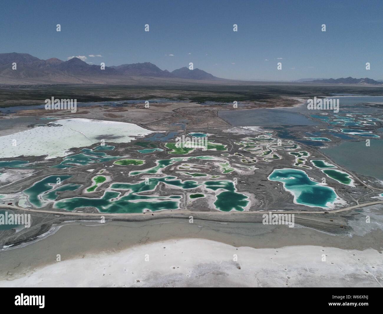 Aerial view of the Da Qaidam salt lake featuring the shape of emeralds ...