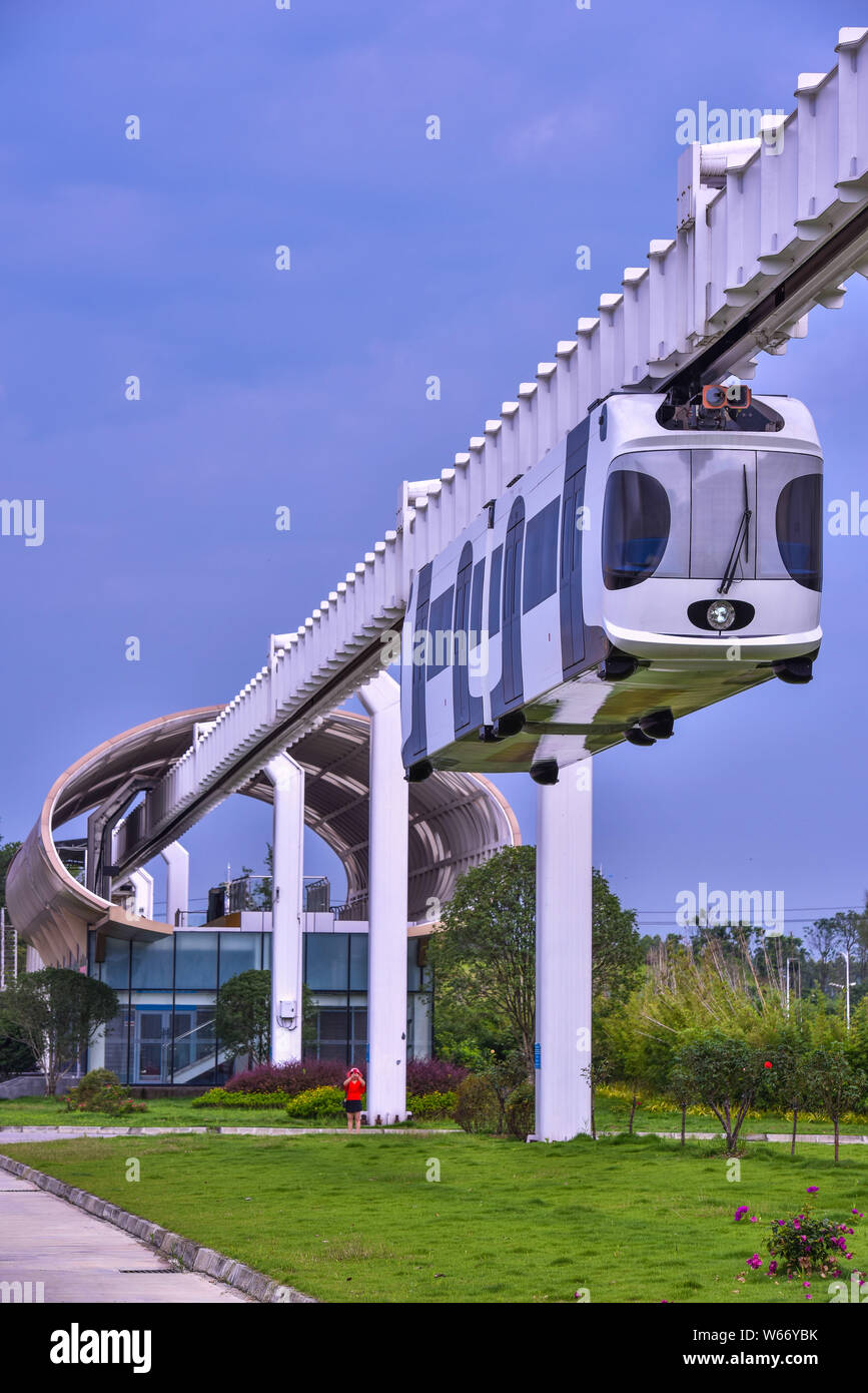 An elevated new energy monorail suspended "Sky Train" decorated to ...