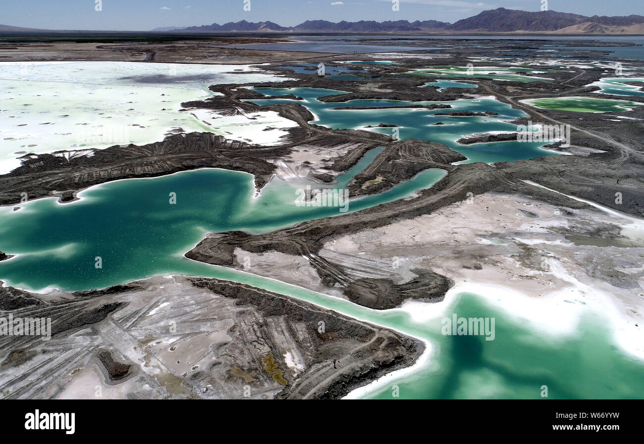 Aerial view of the Da Qaidam salt lake featuring the shape of emeralds ...