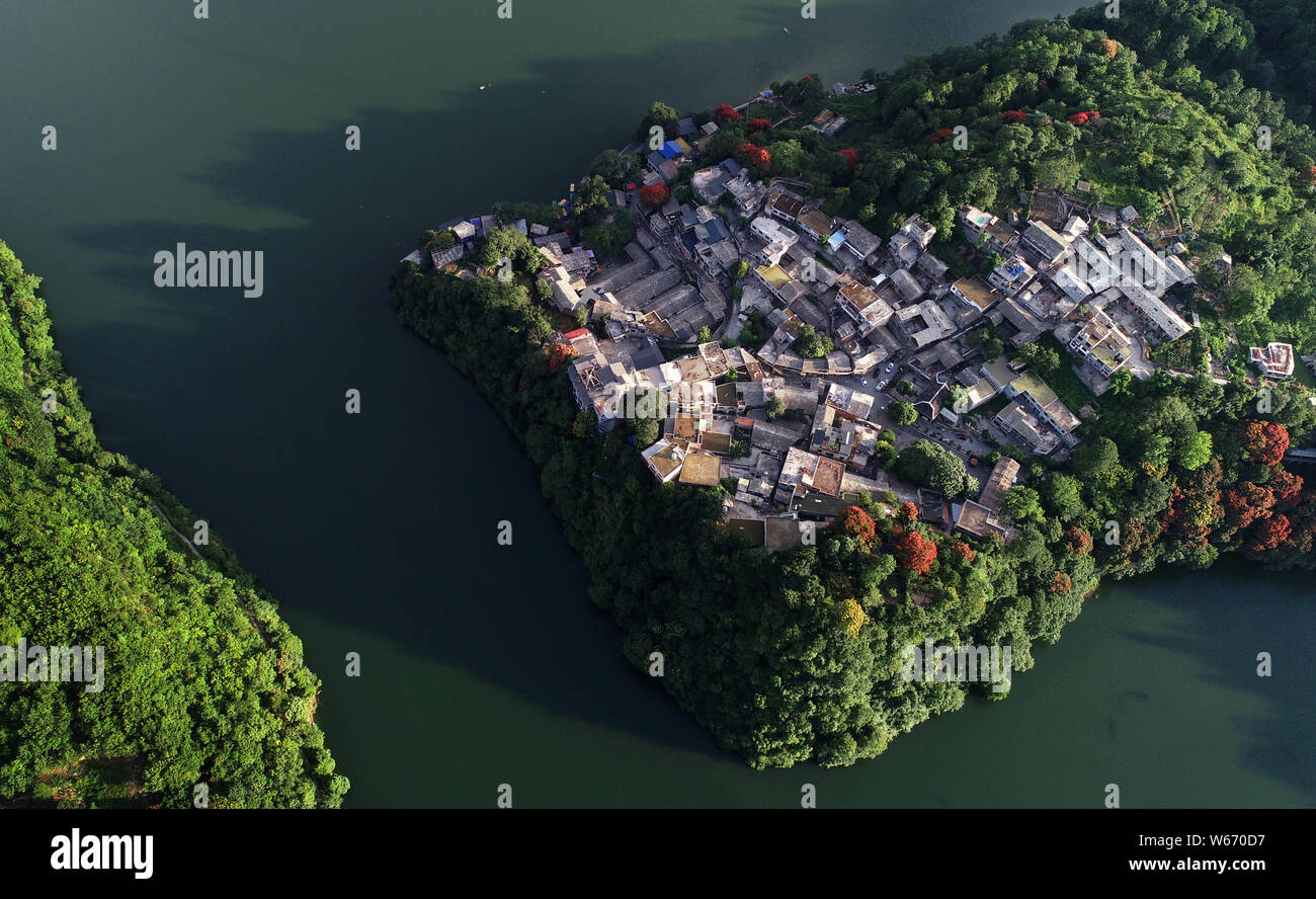Aerial view of the Zhenshan Ethnic Village surrounded by beautiful ...