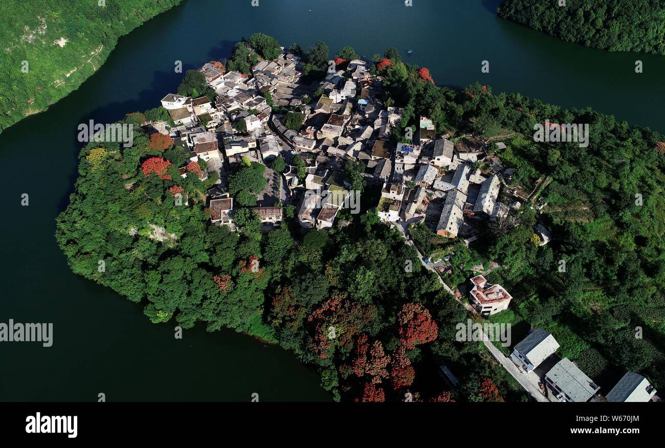 Aerial view of the Zhenshan Ethnic Village surrounded by beautiful ...