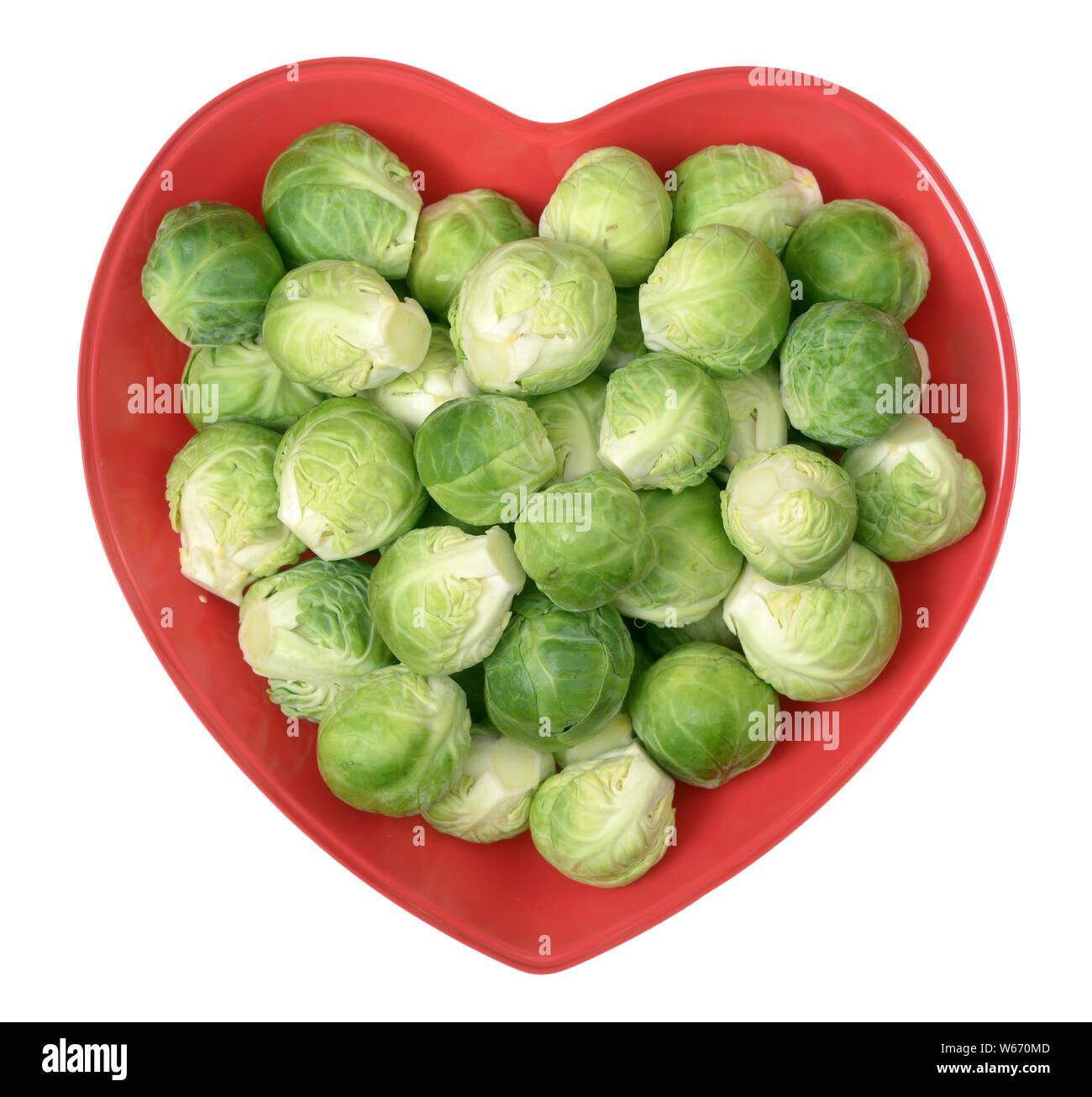 brussel sprouts in heart shape bowl isolated on white background Stock ...
