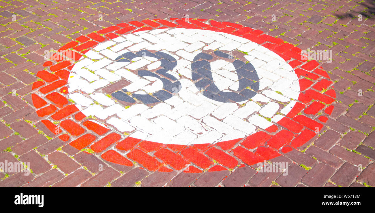 30 km/u road marking on a stone road marking for speed limit Stock ...