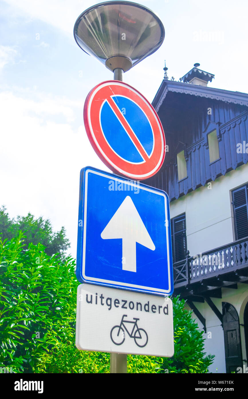 3 Dutch traffic signs in front of an old Dutch house Stock Photo - Alamy