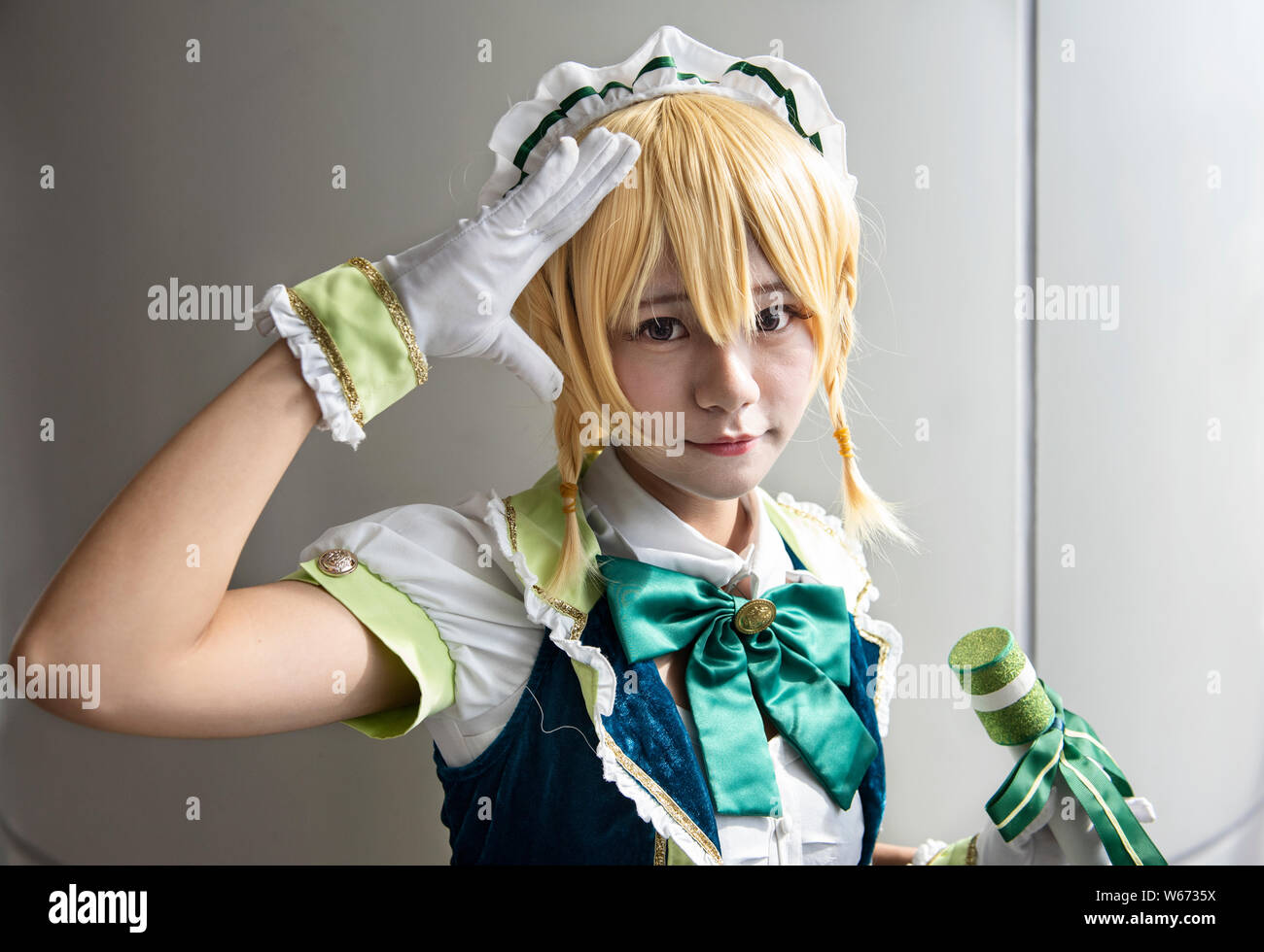 A cosplayer in character poses during the Ani-com and E-Sports and ...