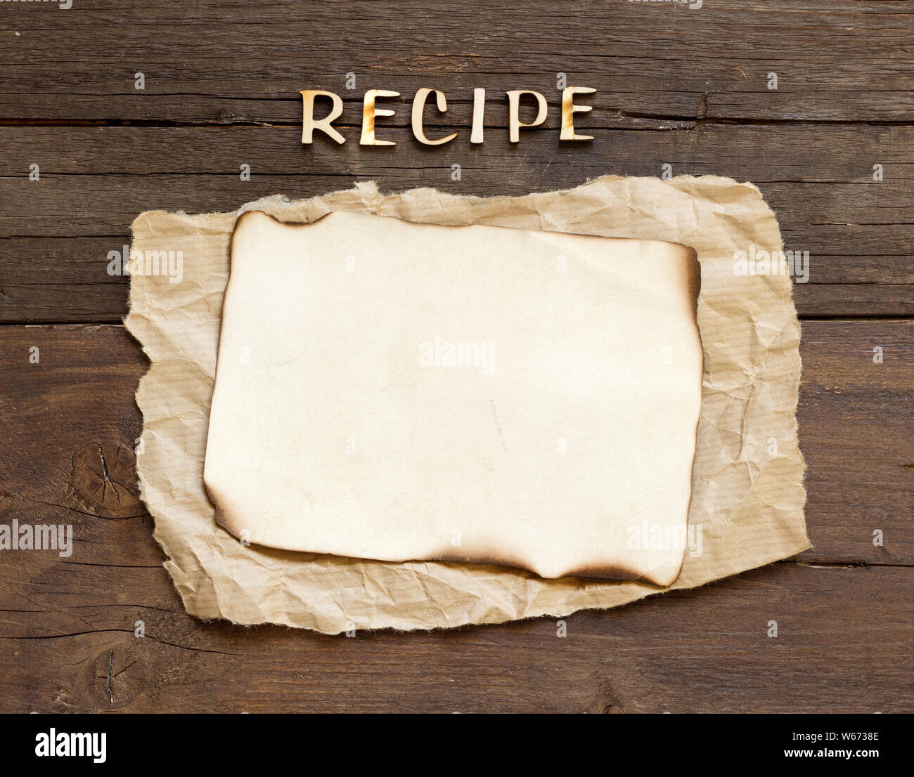 Recipes word with paper on wooden background Stock Photo - Alamy