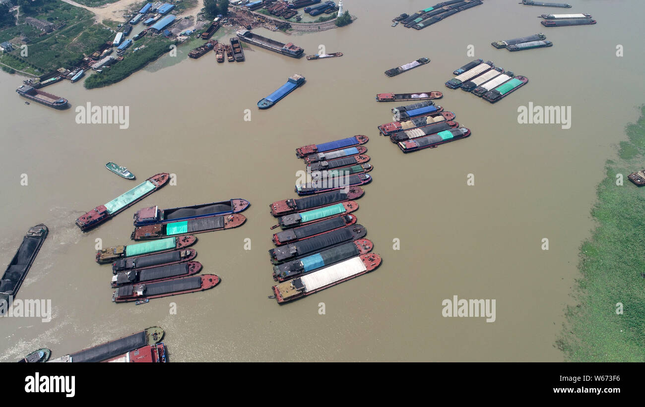 In this aerial view, thousands of ships wait in line to pass a ...