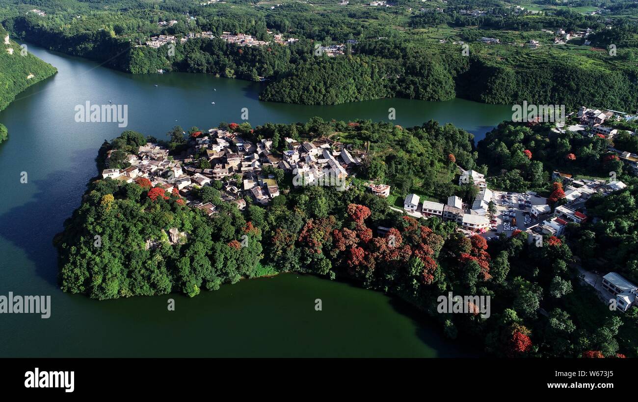 Aerial view of the Zhenshan Ethnic Village surrounded by beautiful ...