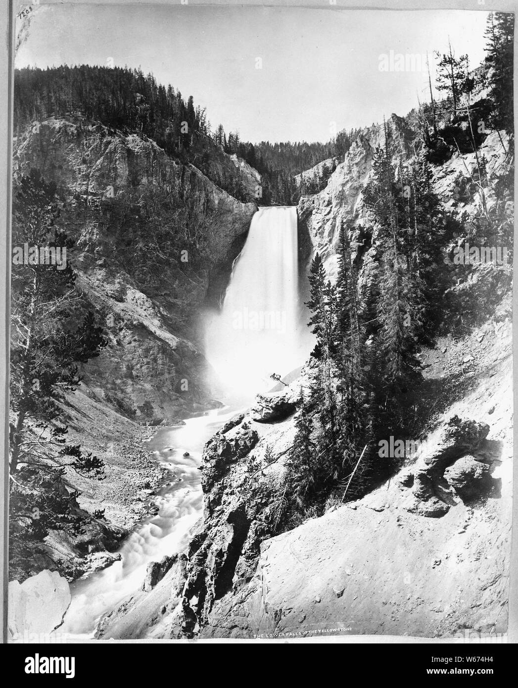 Lower Falls of the Yellowstone from under the Red Pinnacle Stock Photo ...