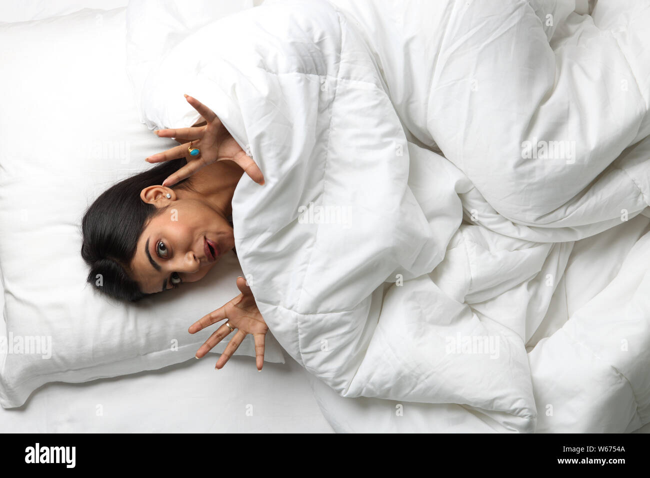 One woman bed afraid hi-res stock photography and images - Alamy