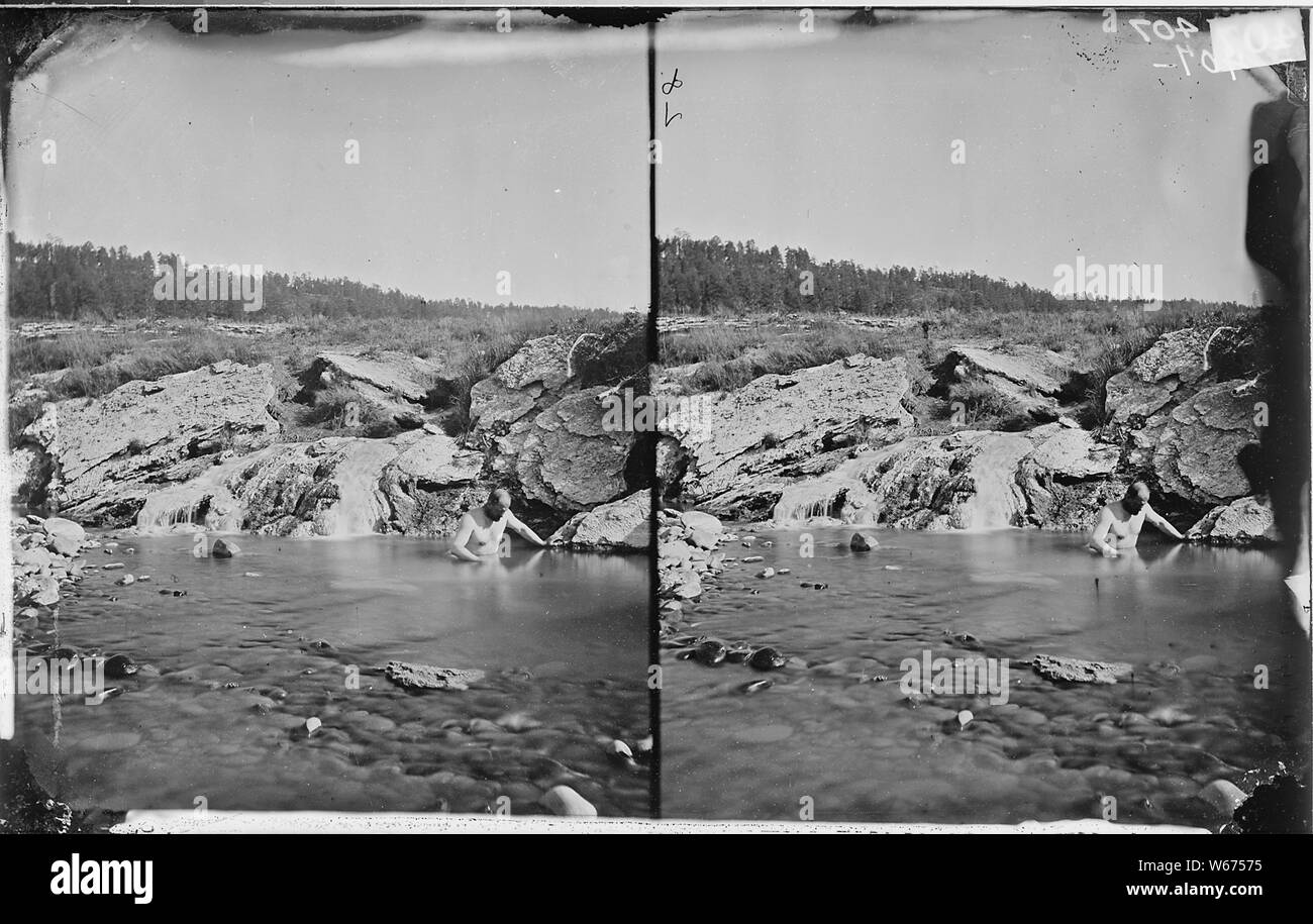 MAN BATHING IN HOT SPRING Stock Photo - Alamy
