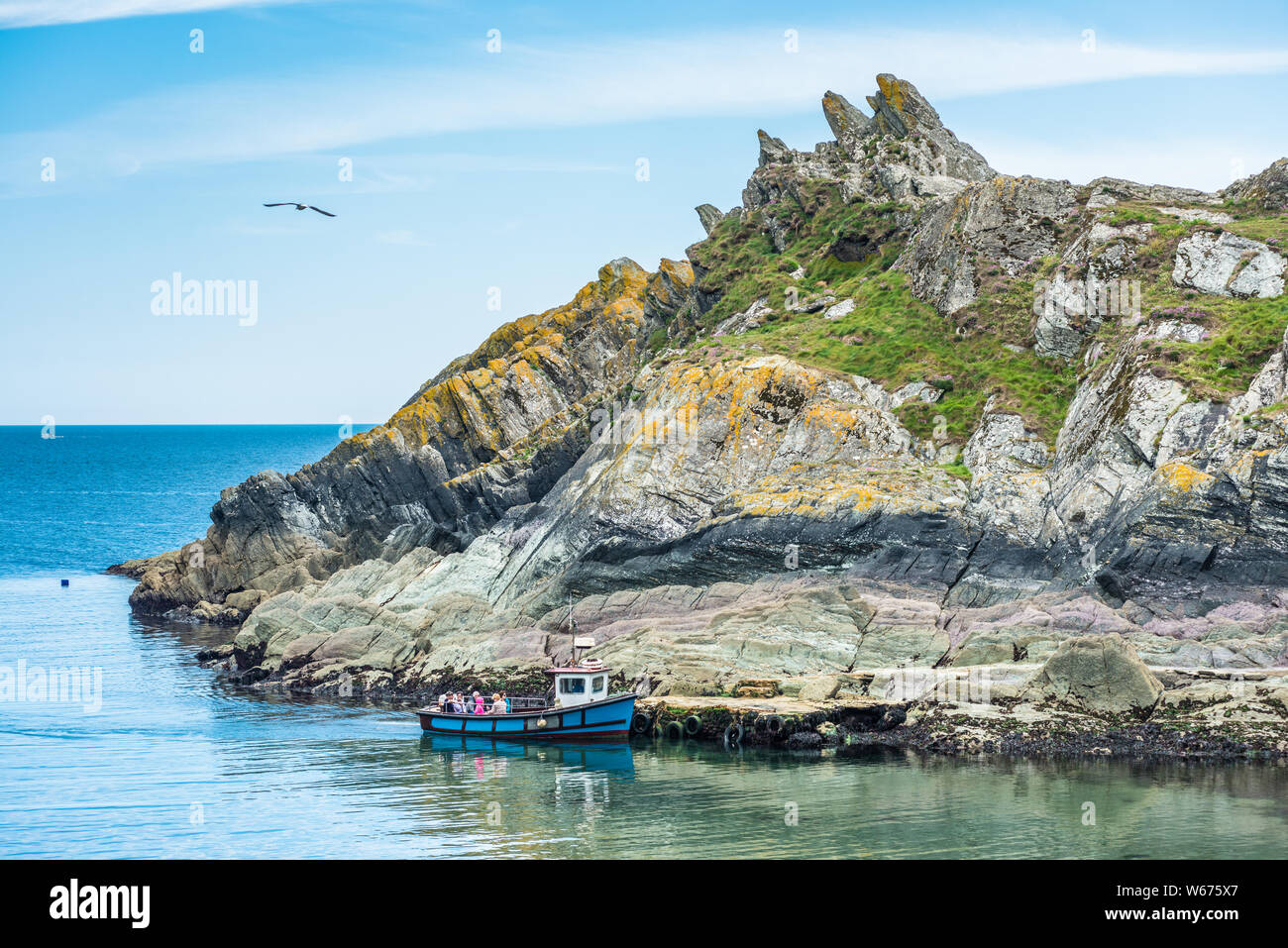 Chapel Rock at the entrance to Polperro harbour in Cornwall, England ...
