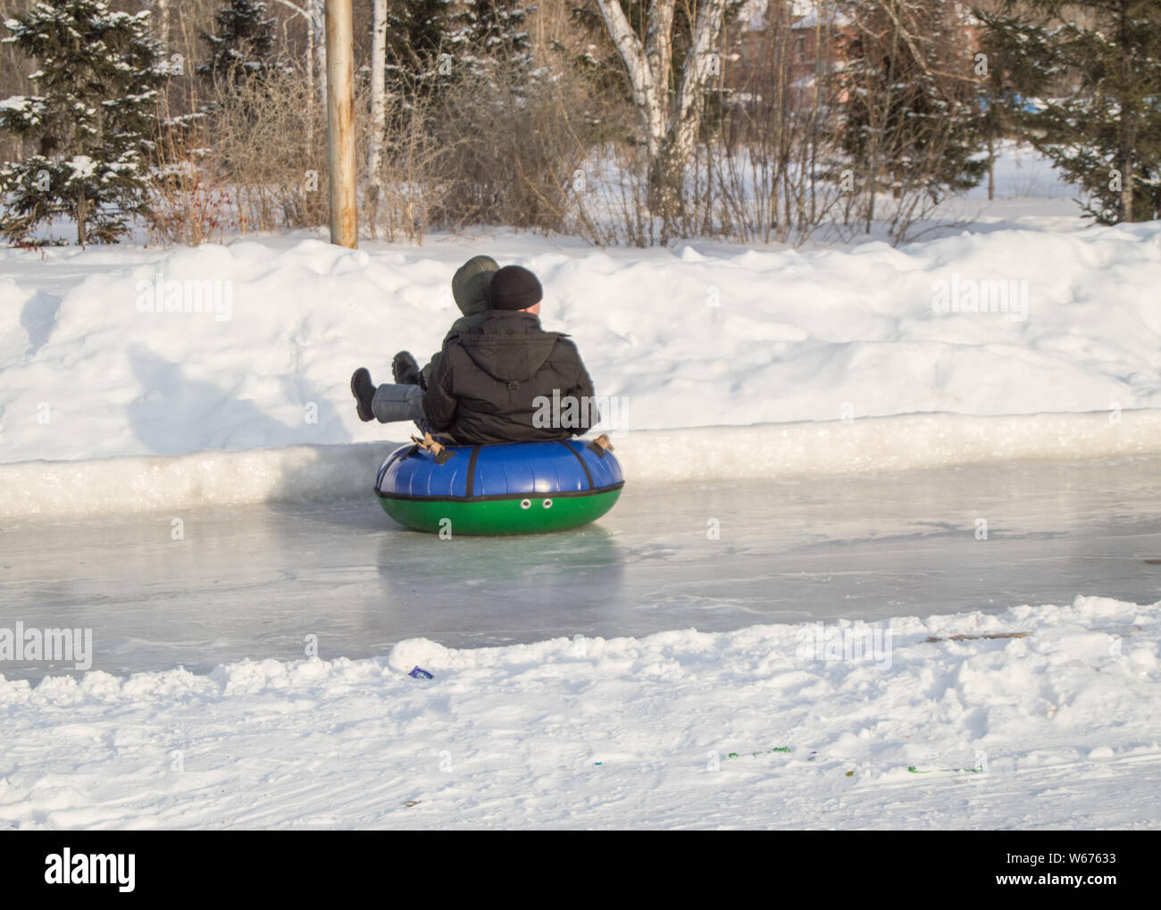Children ride slides on inflatable hi-res stock photography and images ...