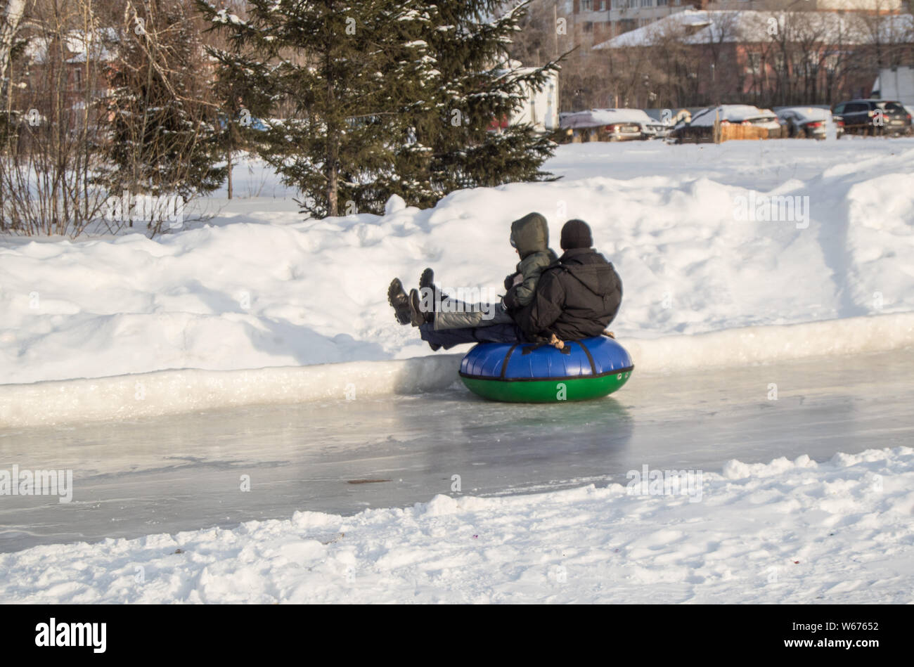 Children ride slides on inflatable hi-res stock photography and images ...