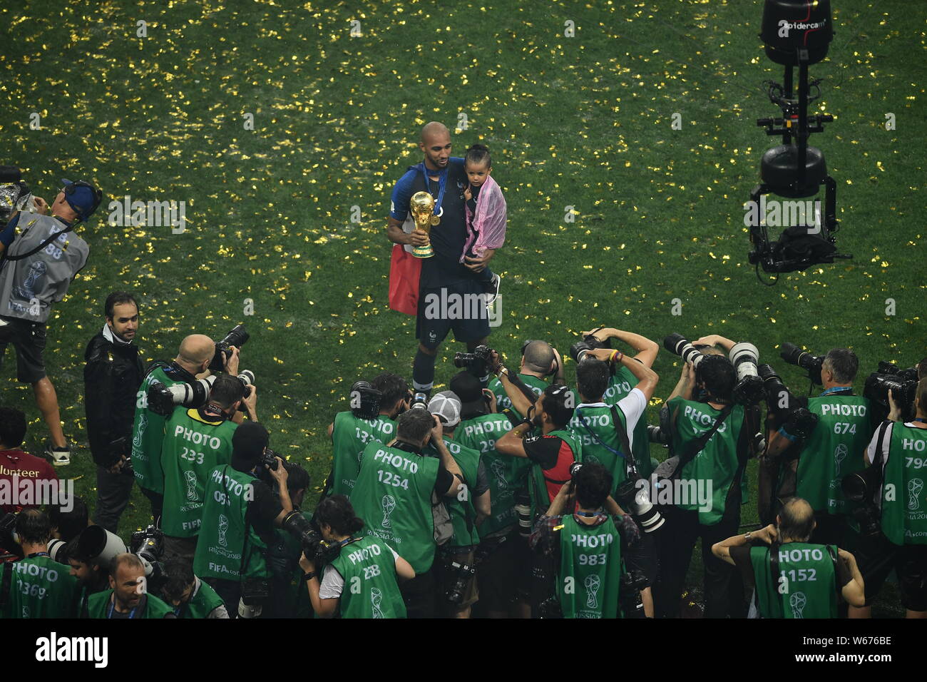 Steven Nzonzi of France poses with the World Cup trophy after France ...