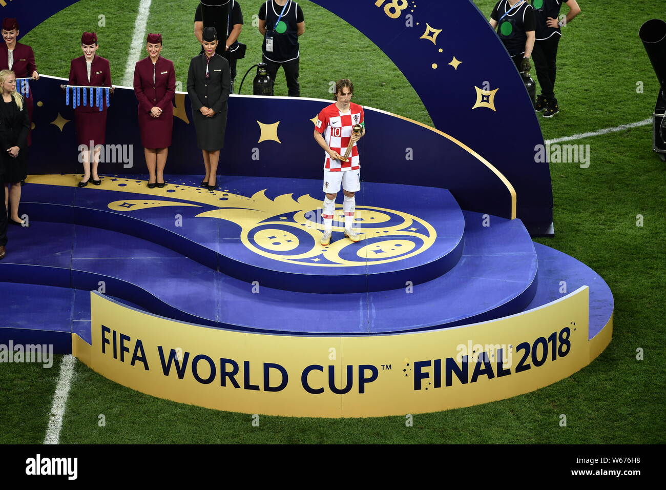 Luka Modric of Croatia poses with his golden ball trophy after France ...