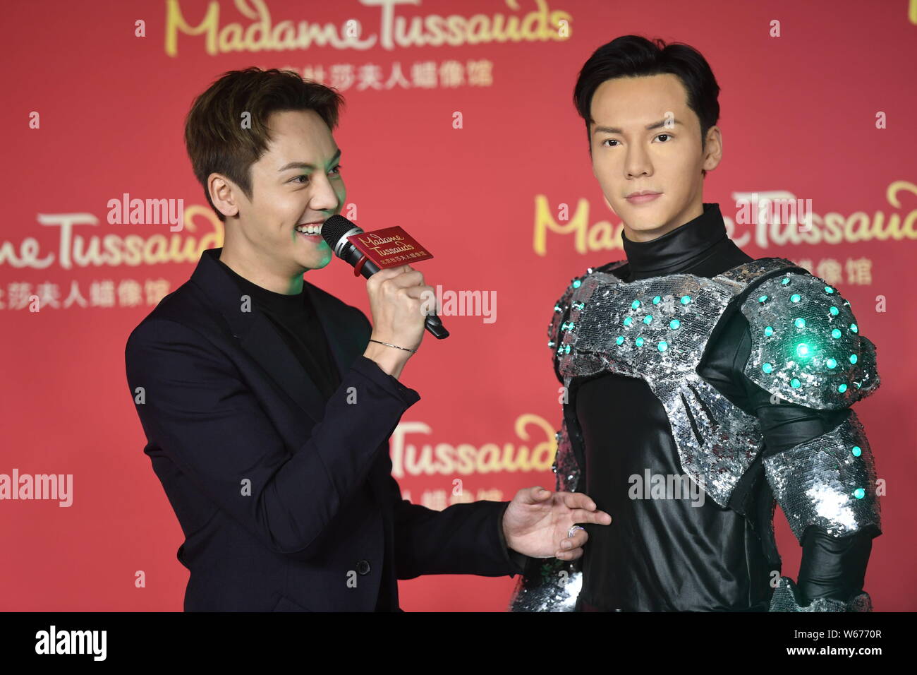 Hong Kong singer and actor William Chan poses during an unveiling ...