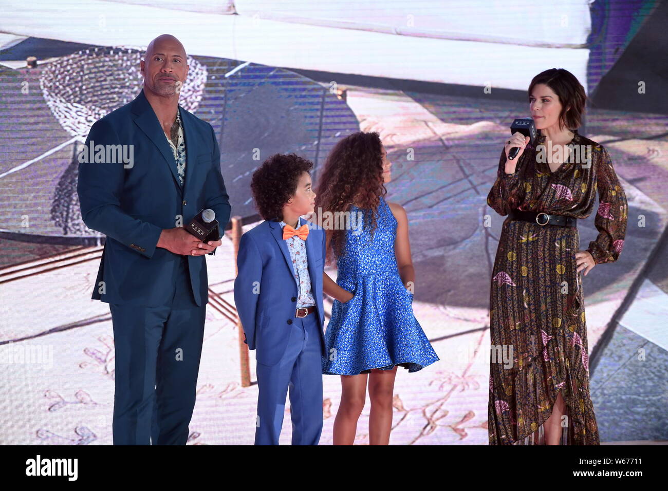 (From left) American actor Dwayne Johnson, child stars Noah Cottrell ...