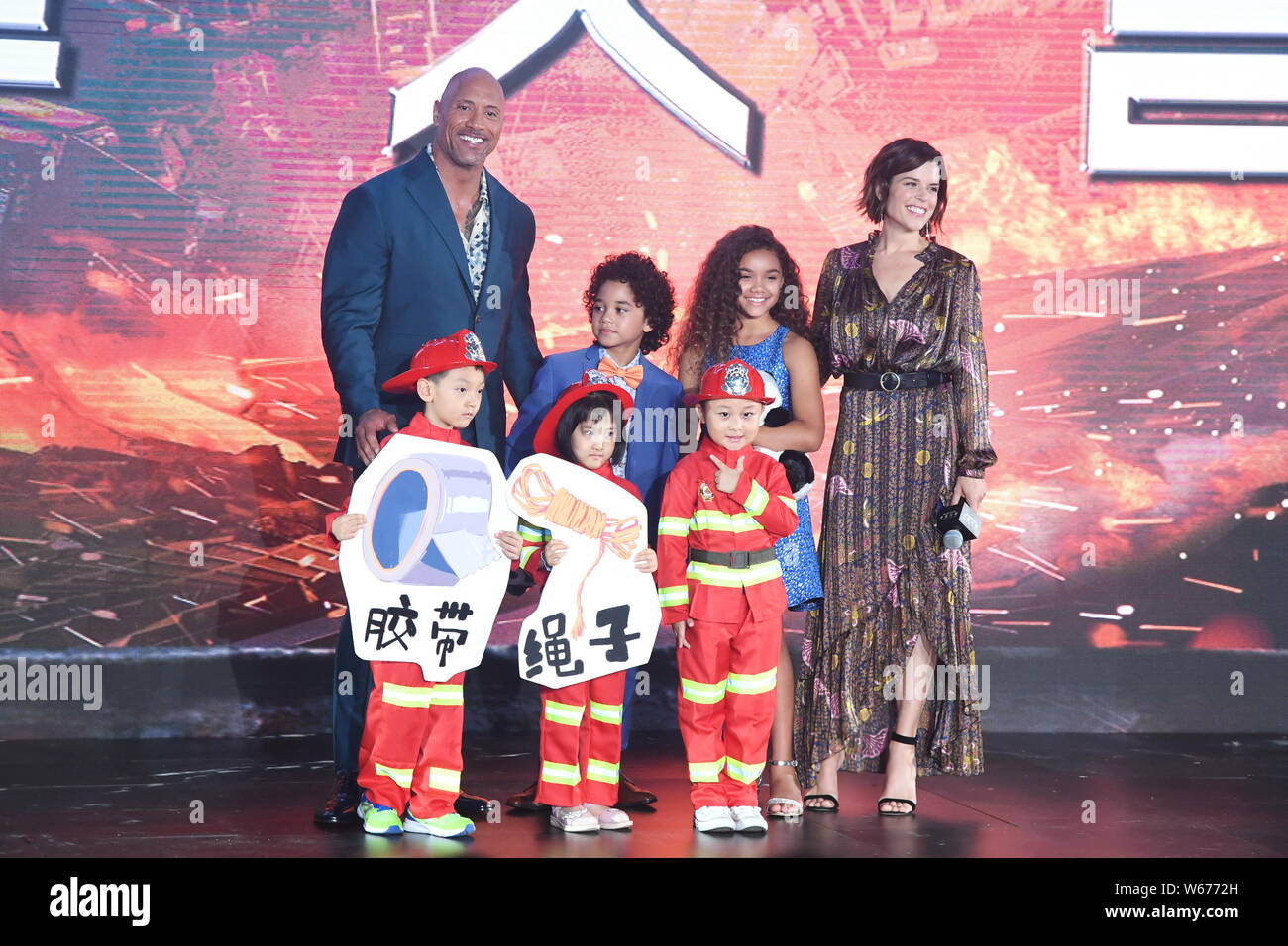 (From left) American actor Dwayne Johnson, child stars Noah Cottrell ...