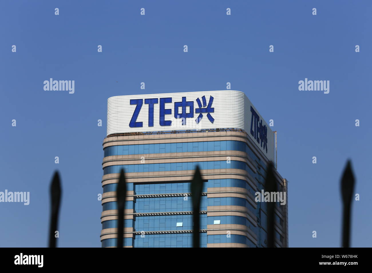 --FILE--View of a signboard of ZTE on the rooftop of an office building ...