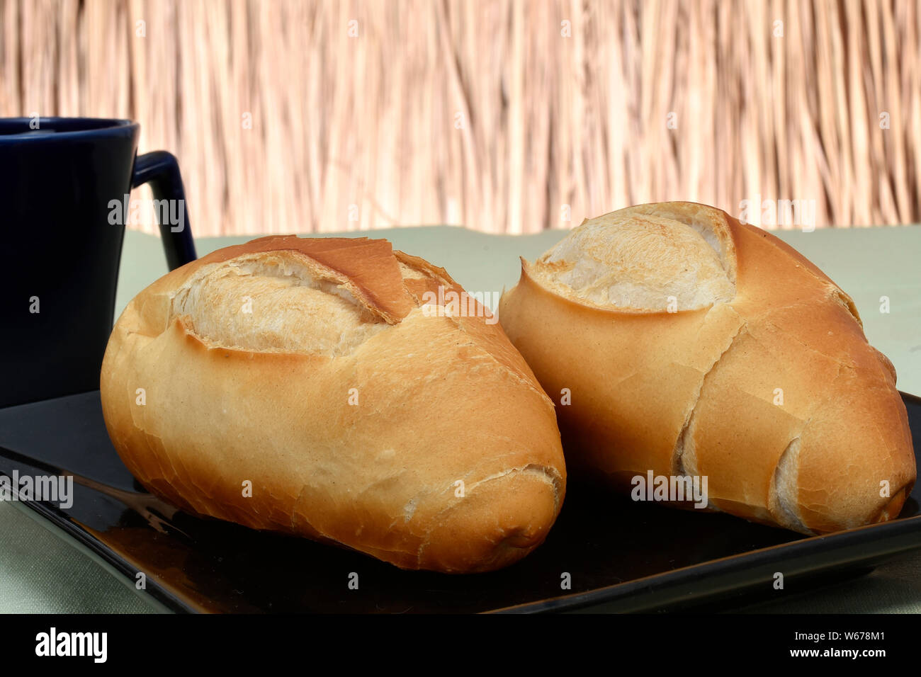 french bread roasted on the table Stock Photo - Alamy