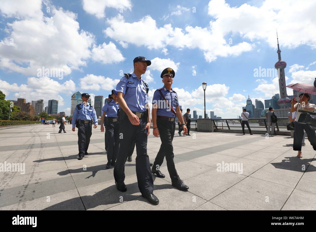 Two Italian police officers conduct joint patrols with Chinese police ...