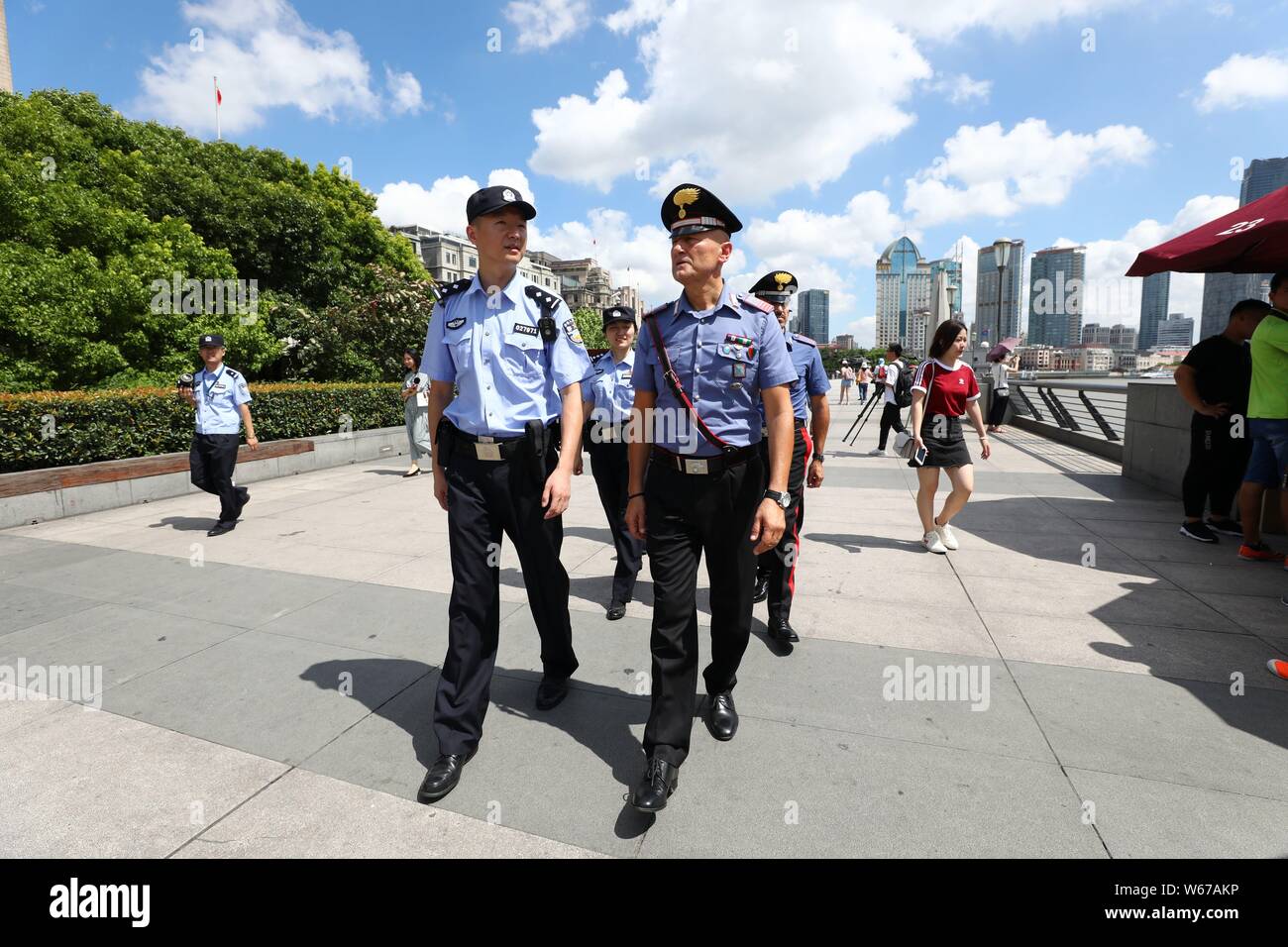 Two Italian police officers conduct joint patrols with Chinese police ...