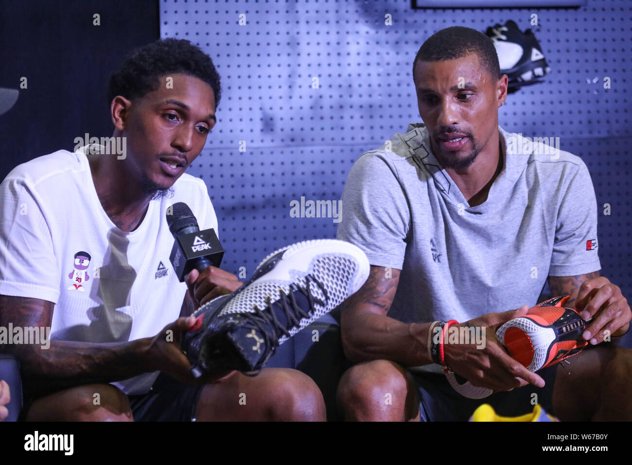 NBA basketball player George Hill of Cleveland Cavaliers, right, and ...