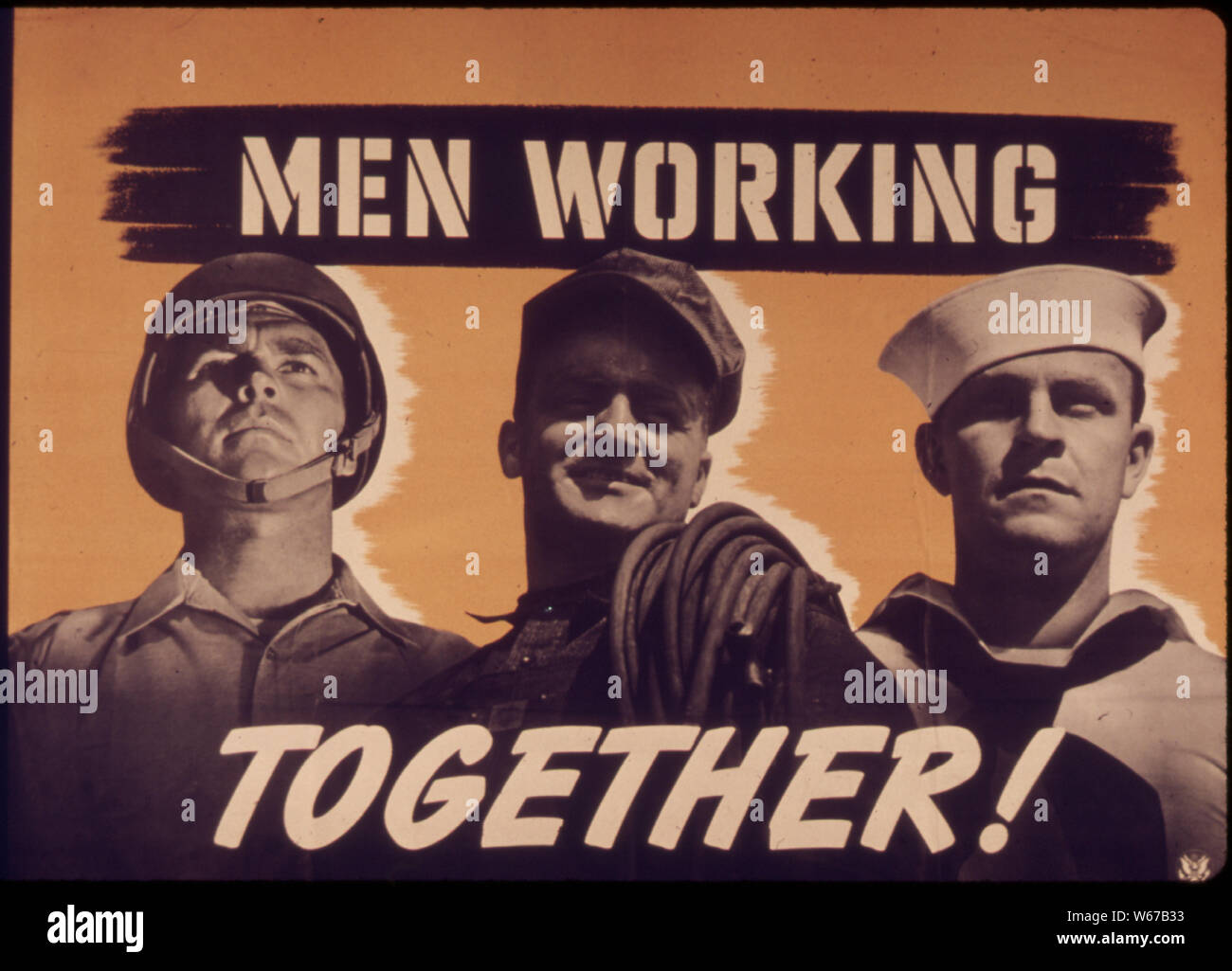 Men working together Stock Photo - Alamy