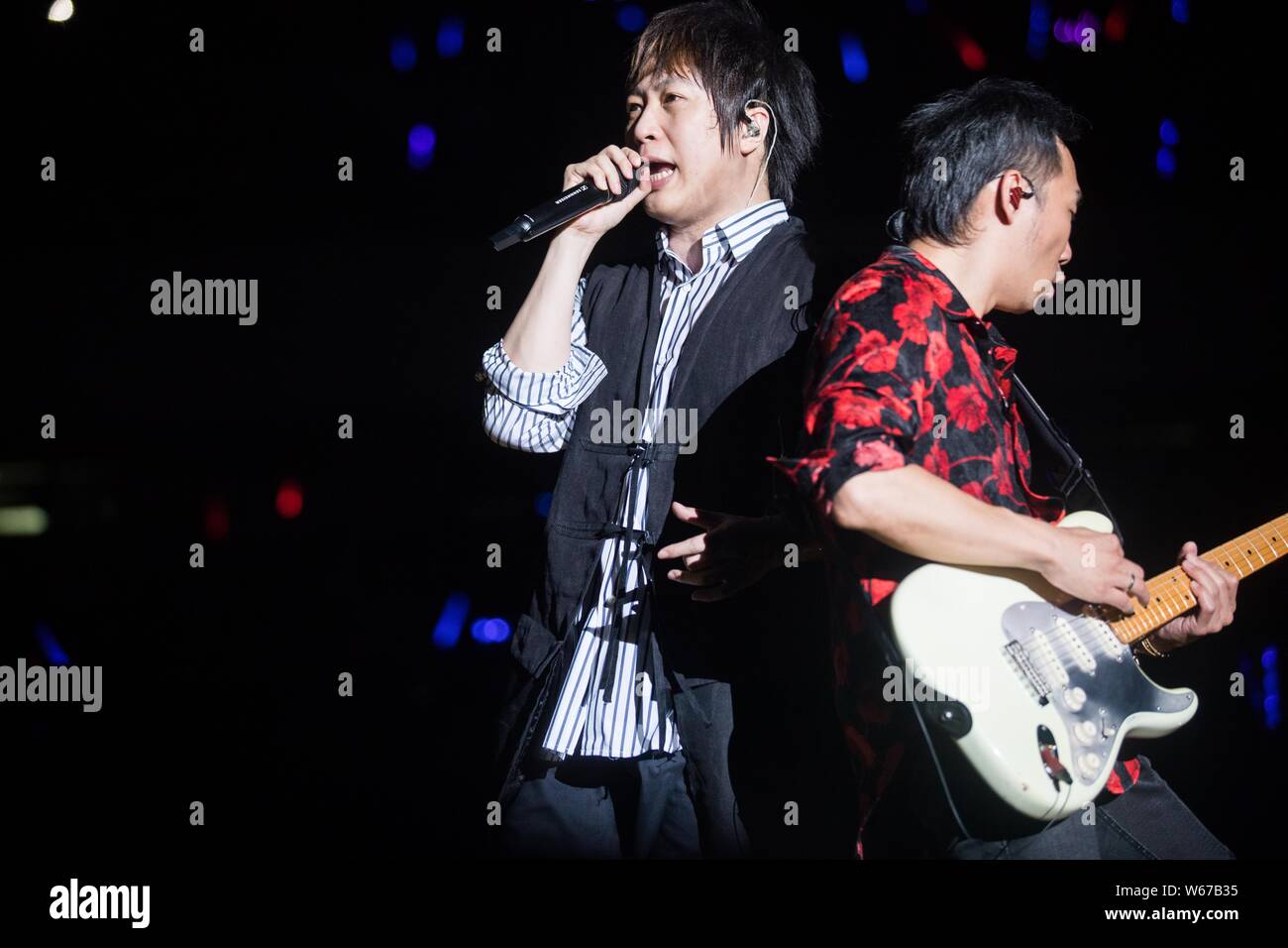 Chen Hsin-hung, better known by his stage name Ashin, left, and Stone ...