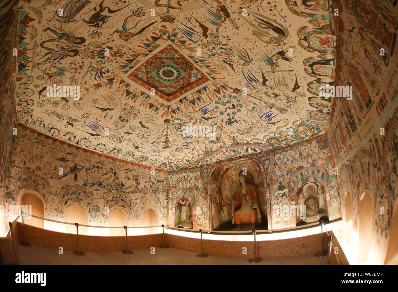 View of the replica of frescoes in the No. 285 grotto of the Mogao Caves during the Dunhuang Art ...