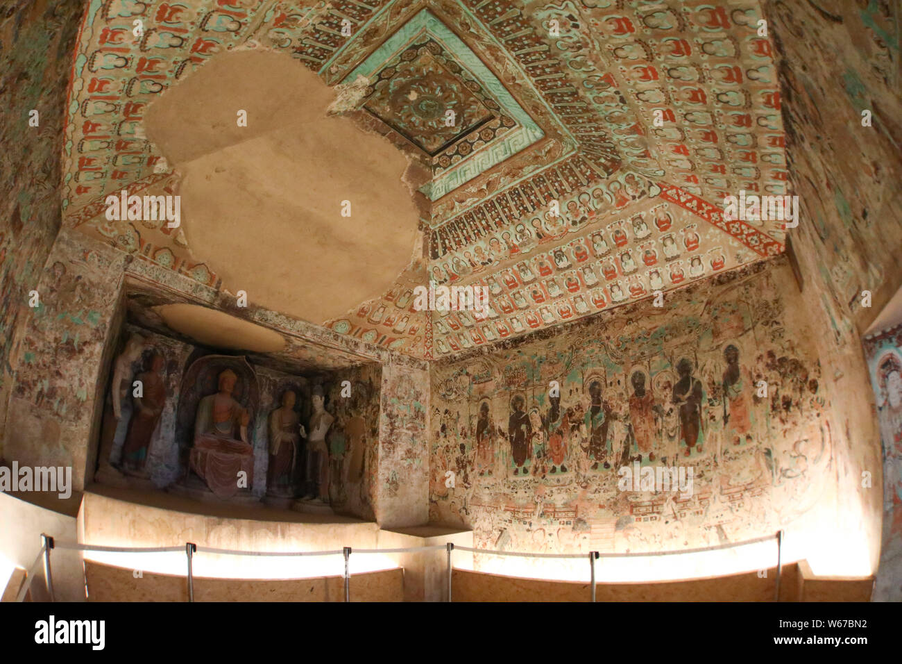 View of the replica of frescoes in the No. 285 grotto of the Mogao Caves during the Dunhuang Art ...