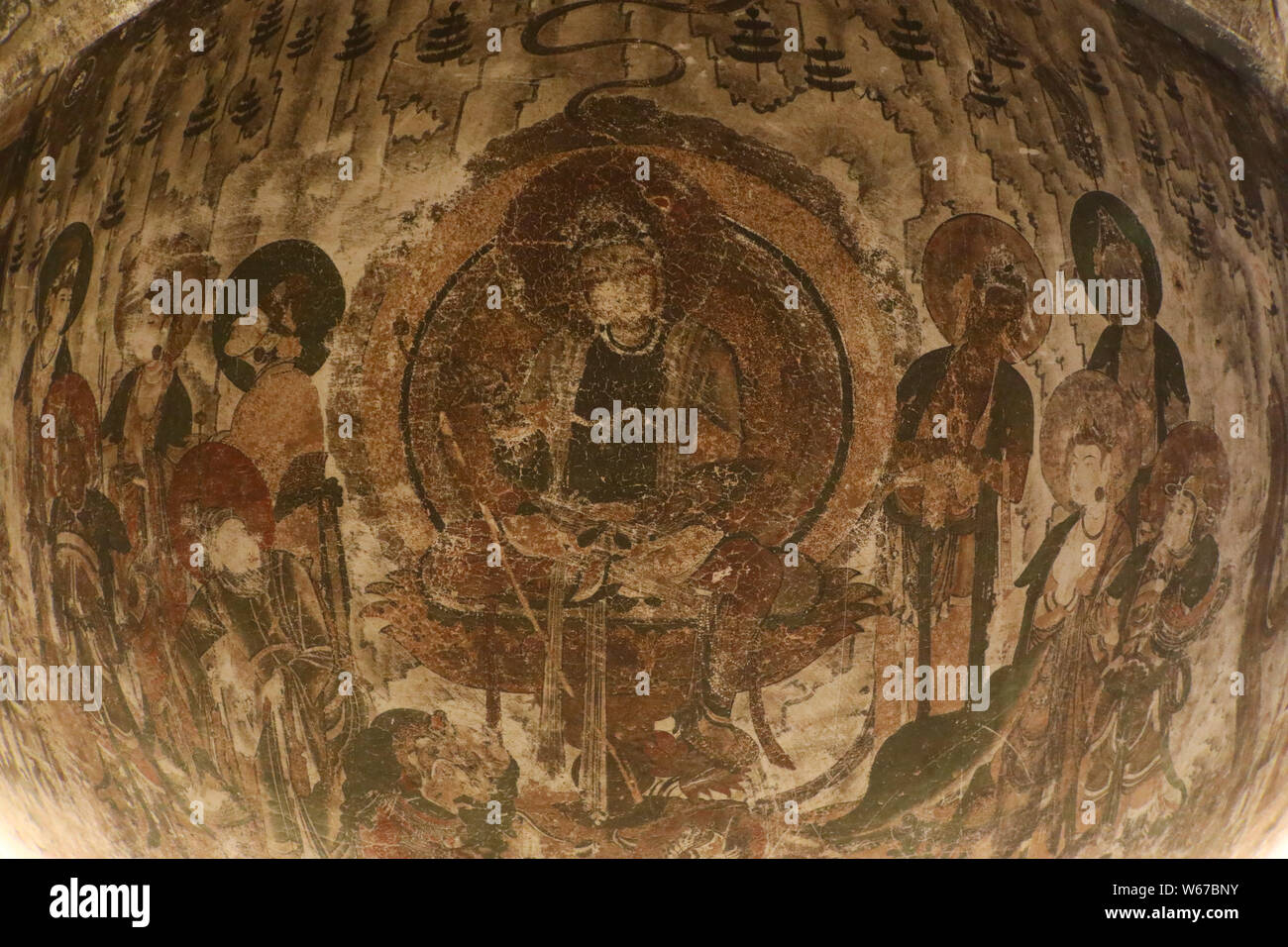 View of the replica of frescoes in the No. 285 grotto of the Mogao Caves during the Dunhuang Art ...