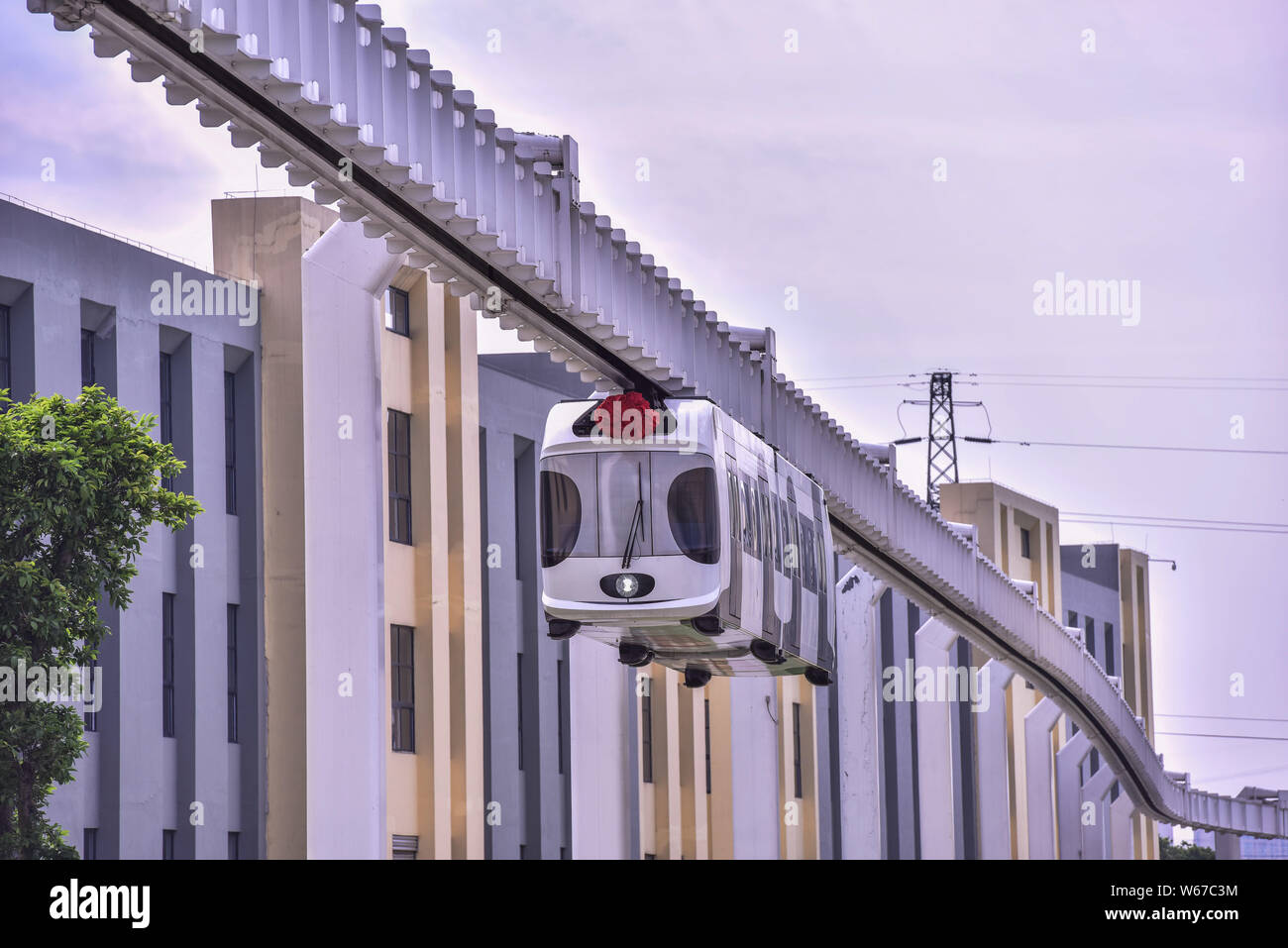 An elevated new energy monorail suspended "Sky Train" decorated to ...