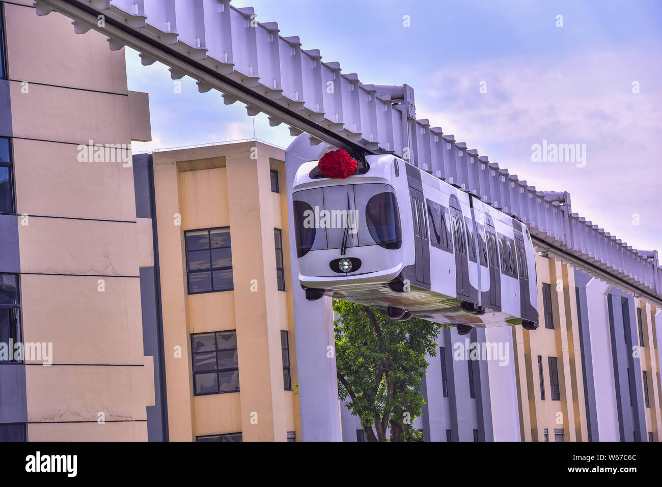 An elevated new energy monorail suspended "Sky Train" decorated to ...