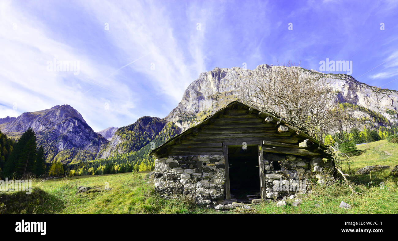 an ancient stone hut in Rocca Pietore just below the Marmolada glacier ...