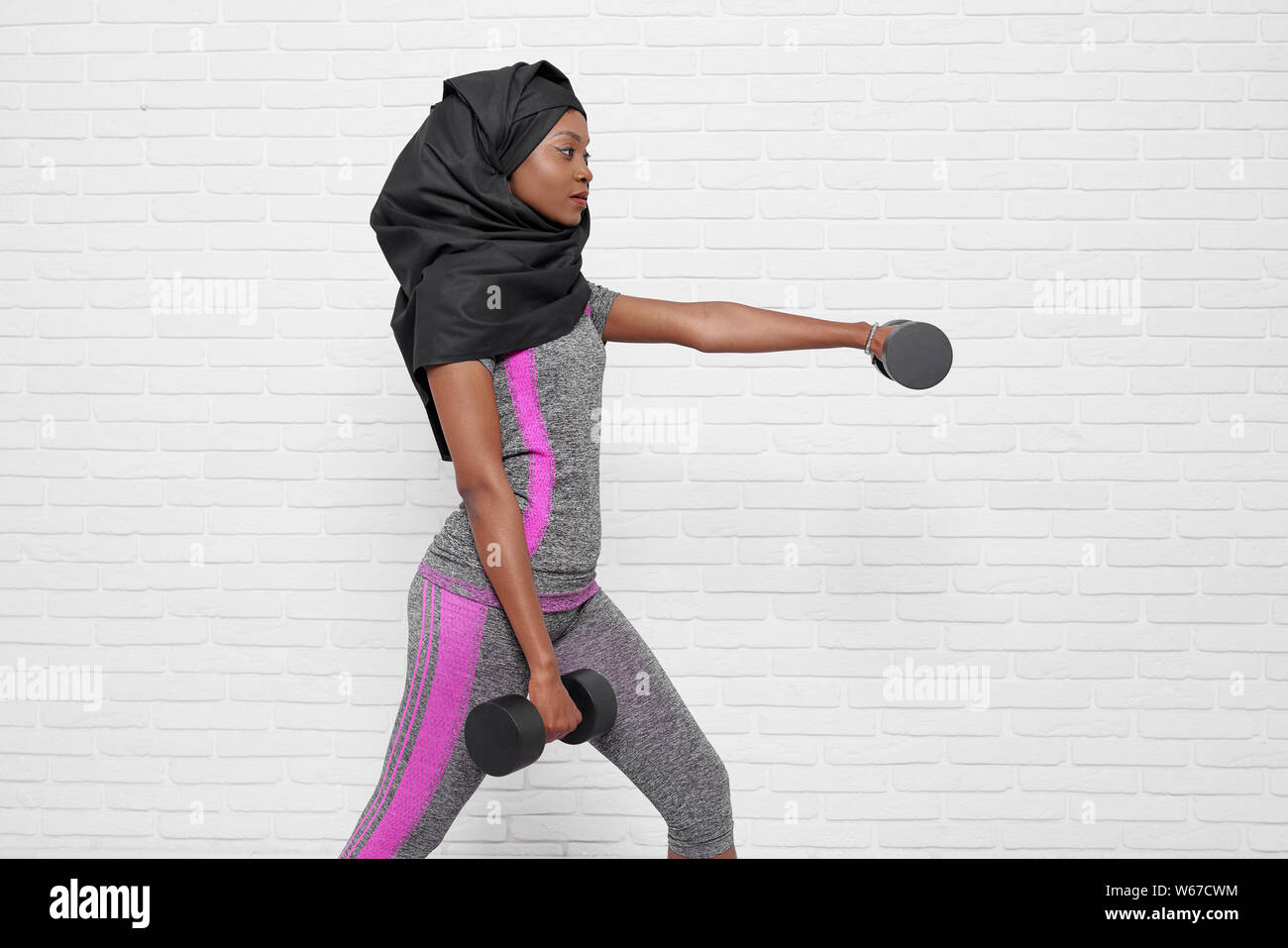 Female muslim athlete hi-res stock photography and images - Alamy