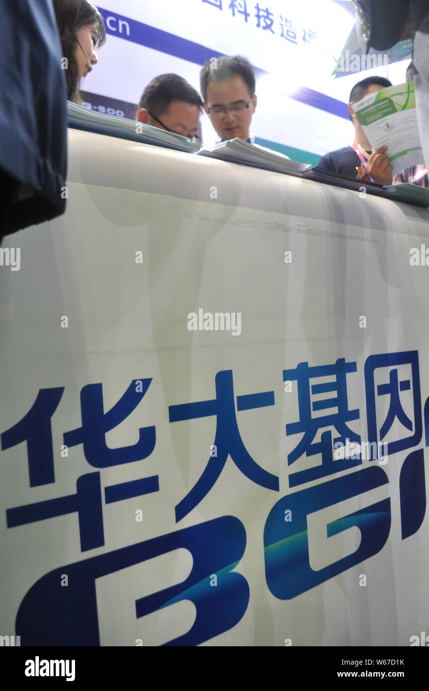 --FILE--People visit the stand of Chinese genome giant BGI Group during ...